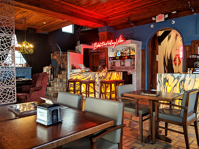 The warm wooden ceiling and illuminated marble bar create a striking contrast at Bacon Bitch, where Miami's breakfast scene gets a rebellious makeover.