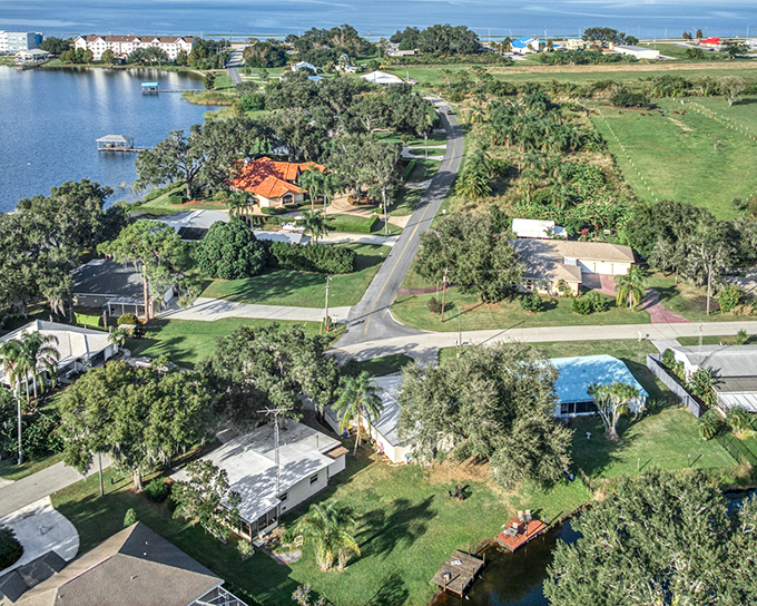 Sebring sprawls across Central Florida like a watercolor painting, where neighborhoods blend seamlessly with nature and the lake dominates the landscape like a liquid centerpiece.