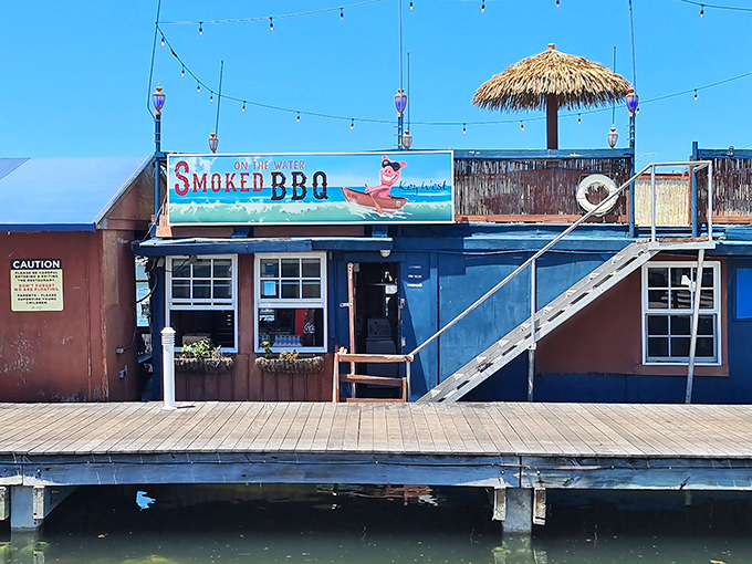 The blue shack with a thatched umbrella isn't just a restaurant&mdash;it's a Caribbean postcard where smoke signals spell "paradise found."