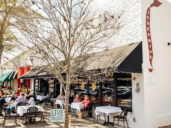 Josephine's inviting fa&ccedil;ade welcomes pasta enthusiasts with its clean white walls, teal signage, and outdoor tables perfect for people-watching while twirling spaghetti.