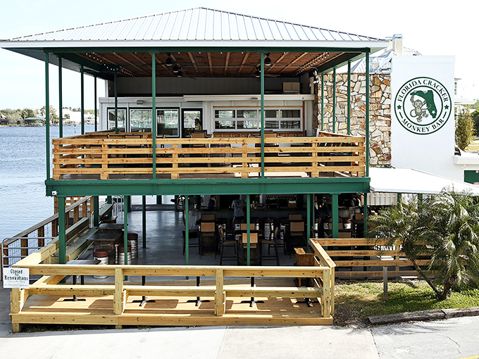 Florida Cracker Monkey Bar stands proudly on the Homosassa waterfront, its two-story structure promising seafood delights and river views that'll make your vacation photos pop.