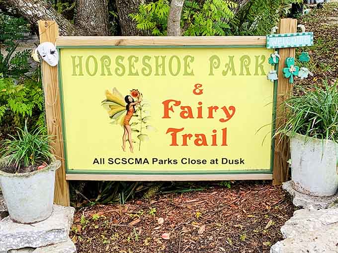 The cheerful entrance sign welcomes visitors to a world where believing in miracles is not just encouraged but practically required for admission.