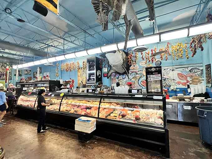 That swordfish overhead isn't decorating the ceiling, it's presiding over a temple of Italian deliciousness where cheese reigns supreme.