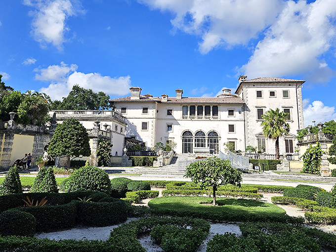 Vizcaya's limestone façade stands proudly against Miami's blue sky, like an Italian count who somehow ended up in Florida but isn't complaining.