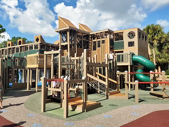 A wooden wonderland where childhood dreams come true &ndash; Sugar Sand Park's massive playground structure reaches skyward like a castle for the young at heart.
