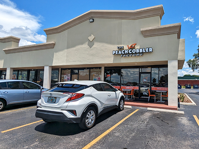 The Peach Cobbler Factory stands like a beacon of sweetness in Tampa, promising dessert dreams that would make your grandmother proud.