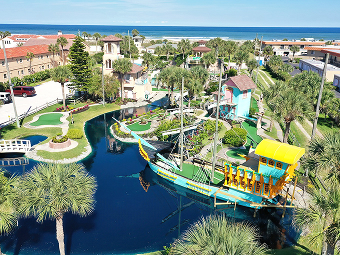 Paradise from above! Fiesta Falls creates its own tropical ecosystem where vibrant waters, lush greenery, and that showstopping Spanish galleon compete for your attention.