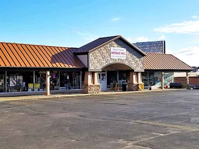 Wally's Treasures stands proudly with its distinctive stone facade and copper roof &ndash; a humble fortress guarding decades of memories and collectibles.