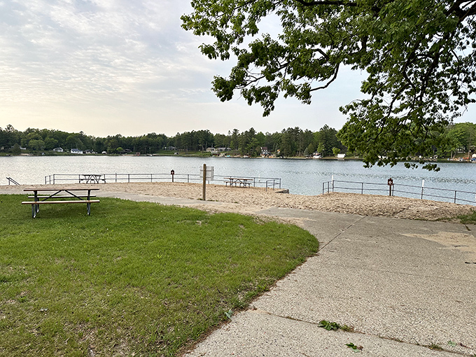 Wilson State Park's tranquil shoreline invites visitors to pause and breathe, where Budd Lake's gentle waves create nature's perfect soundtrack.