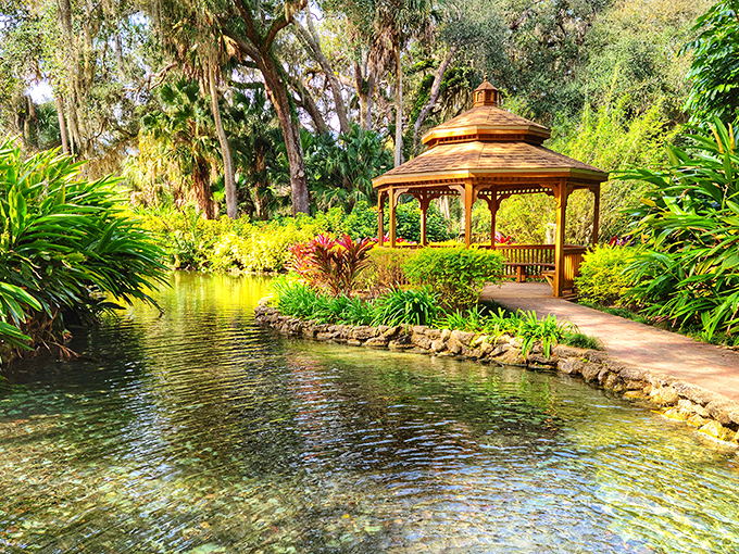 This wooden gazebo seems to float above crystal waters, inviting moments of quiet contemplation.