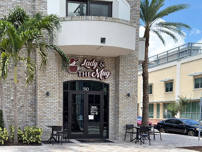 The unassuming brick exterior of Lady and the Mug hides a whimsical wonderland inside, like a coffee-scented speakeasy for the imagination.
