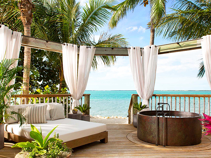 A daybed with ocean views and a copper soaking tub? Someone clearly understood the assignment of "perfect relaxation spot."