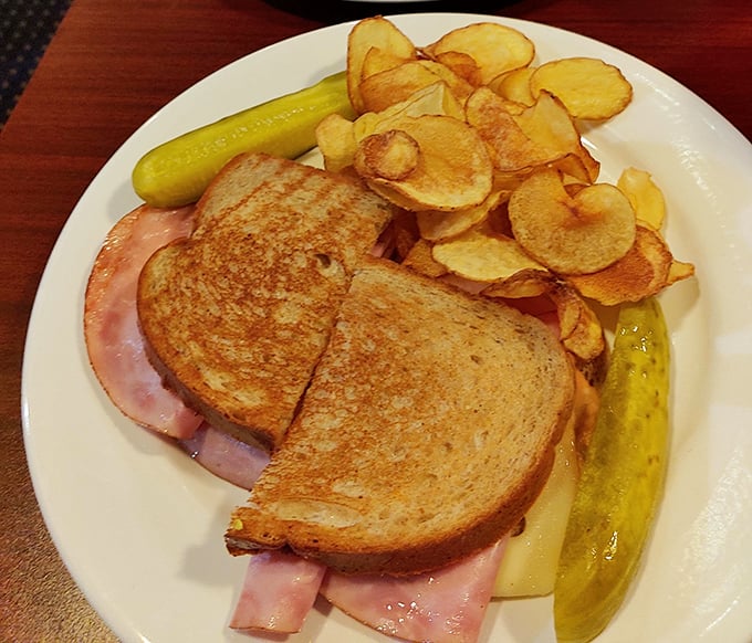 A twist on tradition! Thick-cut ham replaces corned beef in this satisfying sandwich that demands two hands.