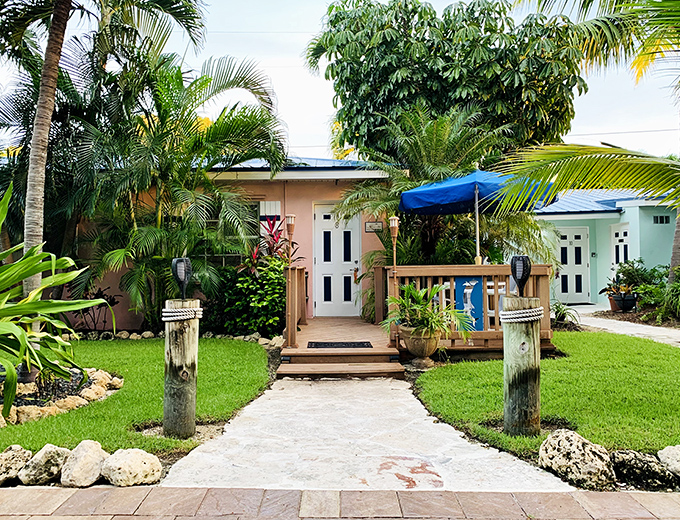 Island Bay Resort's charming cottages nestle among tropical foliage, offering a private retreat after a day of sun-soaked adventures.