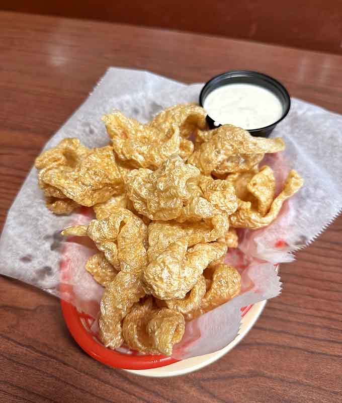Pork rinds elevated from gas station snack to legitimate appetizer worthy of your attention and appetite.