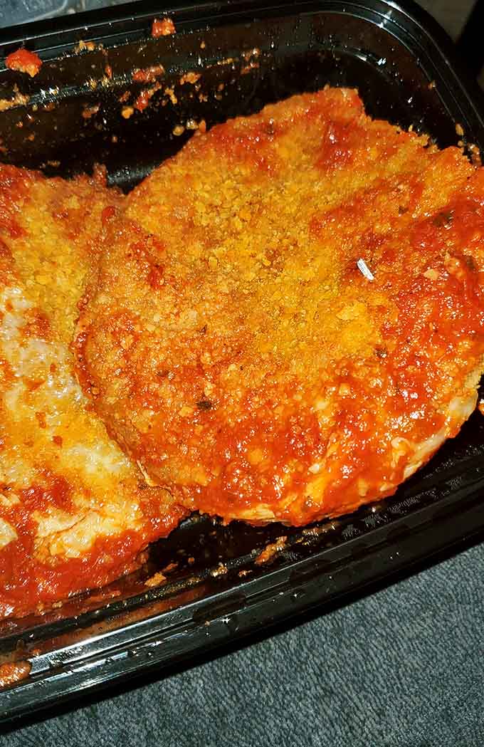 Breaded, sauced, and ready to make your taste buds sing opera, this veal parm patty is Italian-American comfort in its most portable form.