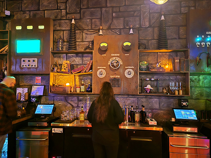 The stone-walled bar area channels mad scientist vibes with its laboratory-like equipment and steampunk-inspired decor elements.