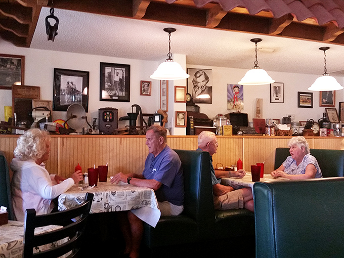 Turquoise booths cradle conversations between regulars and first-timers alike, all united by the universal language of good food.