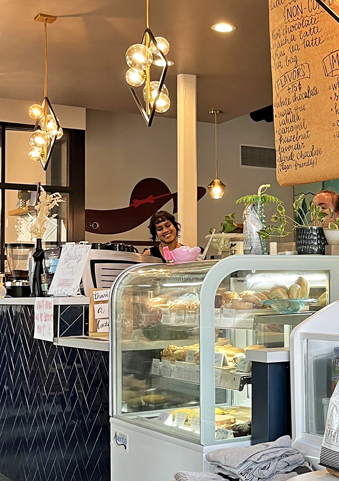 Behind the blue herringbone-tiled counter, baristas craft concoctions with the precision of scientists and the flair of Renaissance painters.