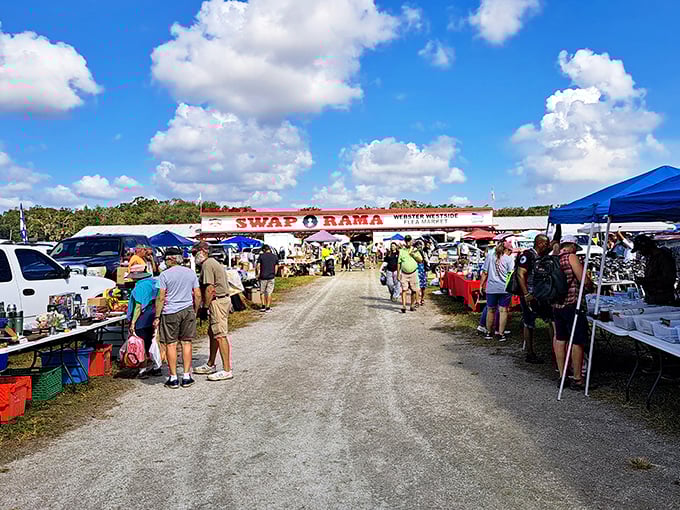 The market's main thoroughfare stretches into the distance, a pathway to potential treasures under Florida's famous sunshine.