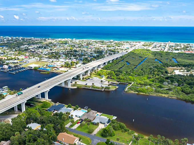 Bridges connect barrier islands along the A1A Coastal Byway, offering drivers spectacular views of both the Atlantic Ocean and inland waterways.