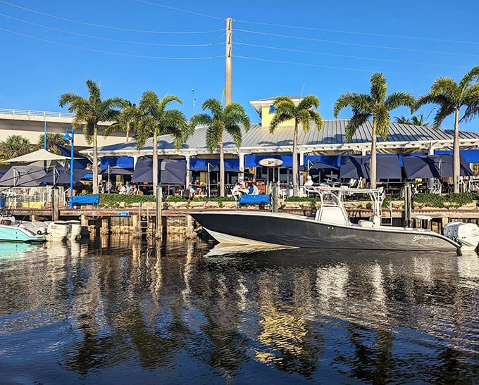 Sailor's Return offers marina-side dining where palm trees sway and boats glide by on Stuart's picturesque St. Lucie River.