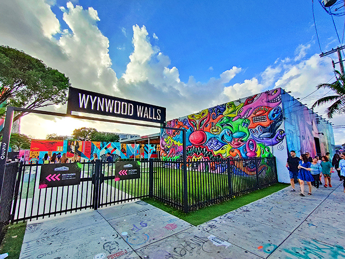 Wynwood Walls' entrance marks the gateway to Miami's most colorful outdoor museum, where street art reaches gallery-worthy status.