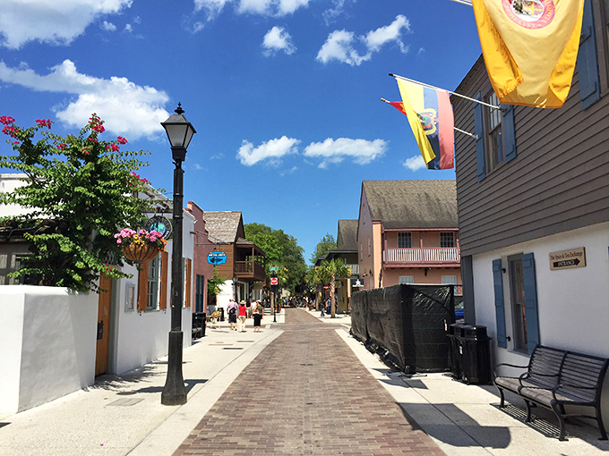 This brick-paved pedestrian street in St. Augustine feels like stepping into a European postcard, complete with colorful flags and wrought-iron lamps.