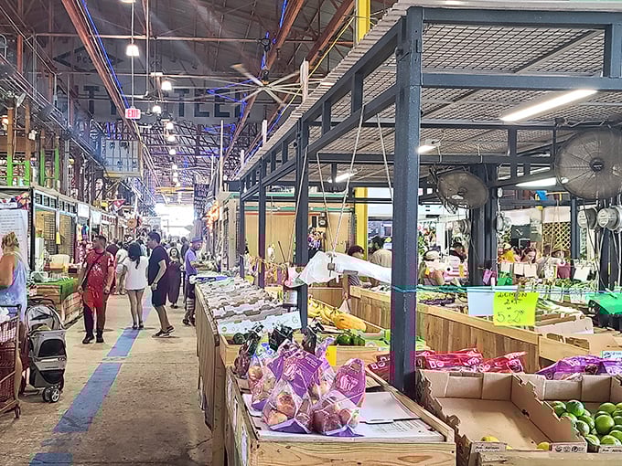 Shoppers explore the wide aisles of Yellow Green Farmers Market, where the international flavor reflects South Florida's diverse population and culinary traditions.