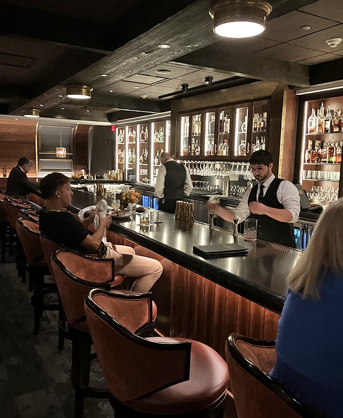 The bar area offers a more casual spot to enjoy your desserts, perfect for those who prefer counter seating with their confections.
