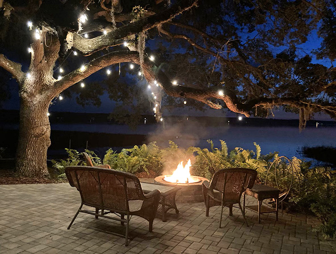 Evening ambiance that no Instagram filter can improve &ndash; string lights and fire pits creating magic that pixels can't capture.