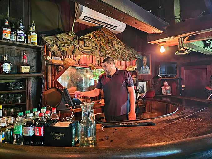 Behind the bar, skilled hands mix drinks with the confidence that comes from serving patrons in a place where hospitality isn't trendy &ndash; it's tradition.