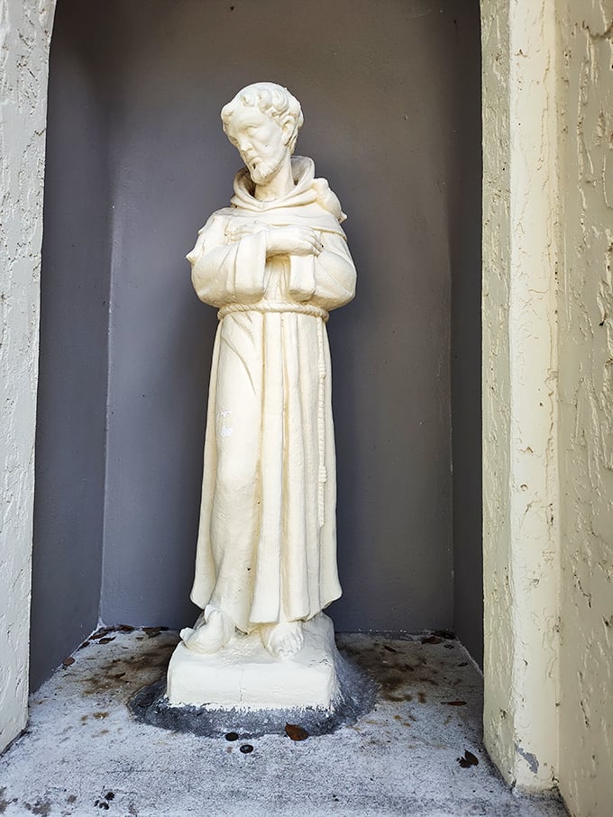 This contemplative statue reminds visitors of the monastery's spiritual origins, his serene expression unchanged by centuries of historical tumult.