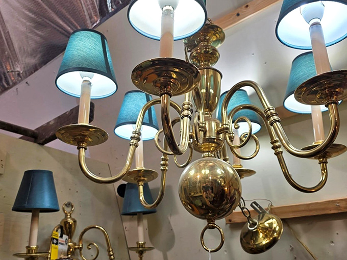 Chandeliers dangle like crystallized memories, casting the kind of warm glow that makes everything (and everyone) look better than modern LEDs ever could.