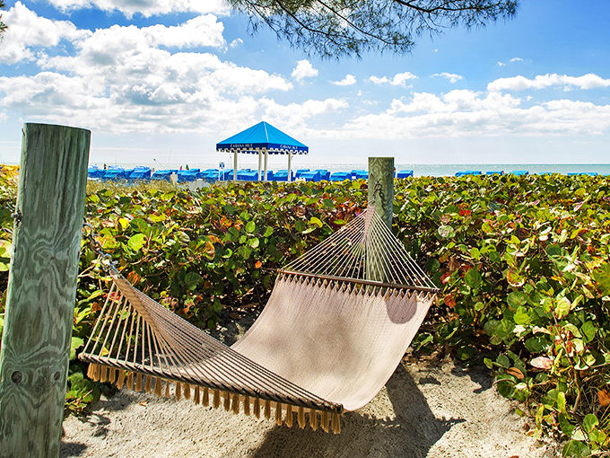 A hammock nestled among sea grapes offers the ultimate vacation decision: nap now or nap later? Either way, you're winning at relaxation.