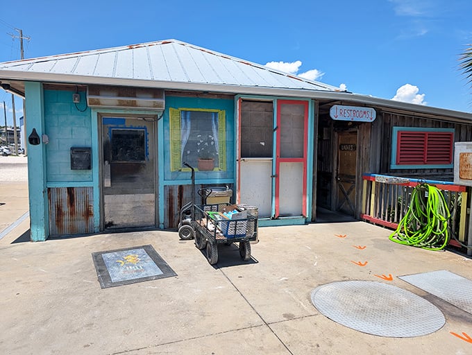 Even the restrooms got the memo about coastal charm &ndash; function meets whimsy in this technicolor necessity.