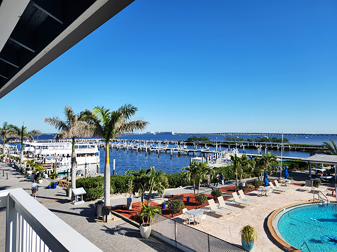 The swimming pool and marina view create that perfect Florida moment where you can't decide whether to take a dip or just stare at the water.