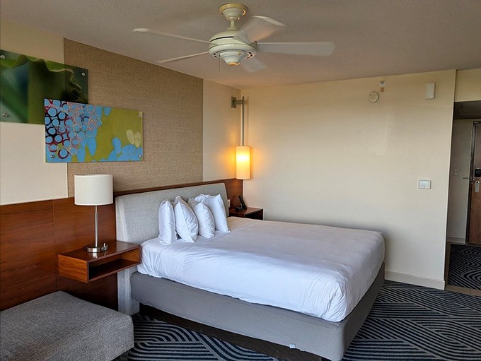 Clean lines and contemporary comfort define the guest rooms, where rest comes easy after a day of waterfall swimming.