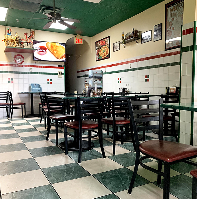Green ceilings hover over pristine tables in this no-frills dining room where the focus remains squarely on the food.