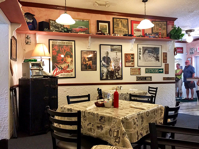 Newspaper-print tablecloths and walls lined with nostalgia create the perfect backdrop for meals that taste like cherished memories.