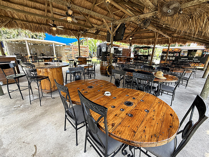 The open-air thatched dining area offers rustic charm and front-row seats to nature's show, perfect for post-swim refreshments.
