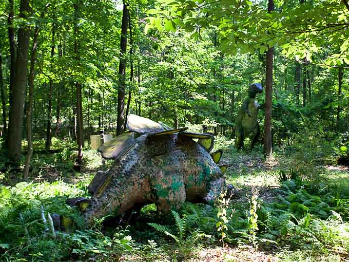 The Triceratops appears to be enjoying its retirement, lounging comfortably in a bed of ferns and wildflowers.