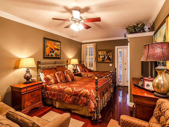 Warm Classic Bedroom: Rich tones and elegant furnishings create a cozy retreat where you might catch the occasional whiff of a phantom cigar.