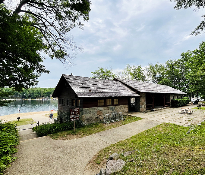 The historic beach house stands as a testament to thoughtful architecture, where form and function create the perfect lakeside companion.