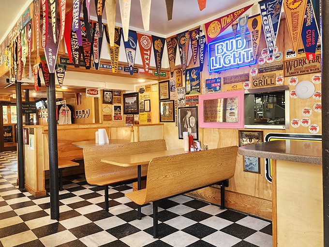 Vintage signs and nostalgic advertisements cover every available inch of wall space, creating a museum of mid-century Americana.