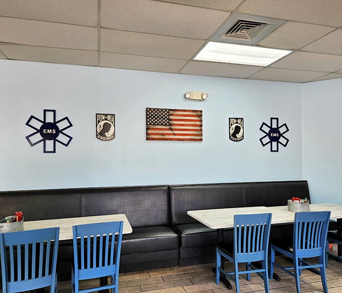 Patriotic blue walls and first responder emblems showcase the restaurant's community pride – where breakfast comes with a side of American spirit.