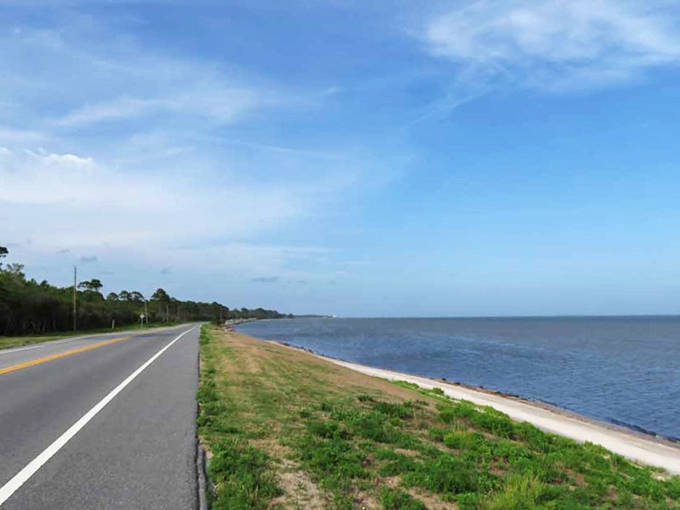 The Big Bend Scenic Byway hugs Florida's forgotten coast, where undeveloped shorelines and fishing villages maintain Old Florida charm.