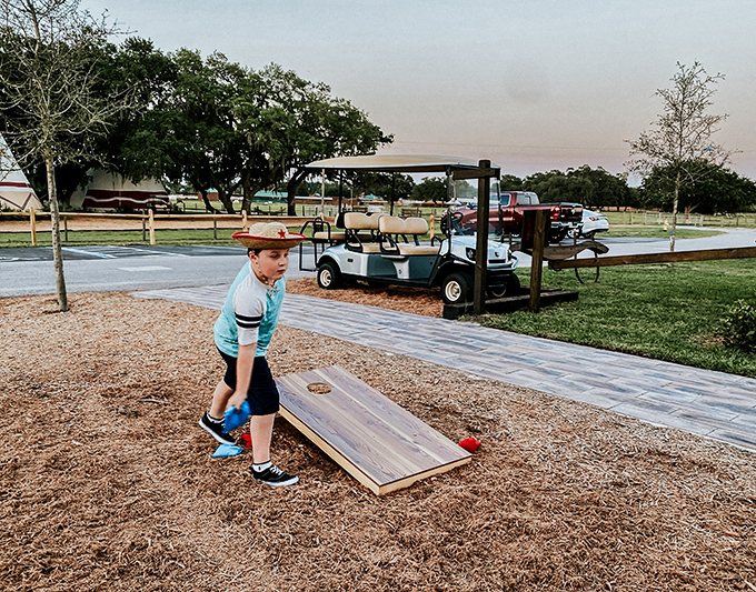 Cornhole competitions bring out the competitive spirit in guests of all ages, proving some frontier skills require more precision than strength.