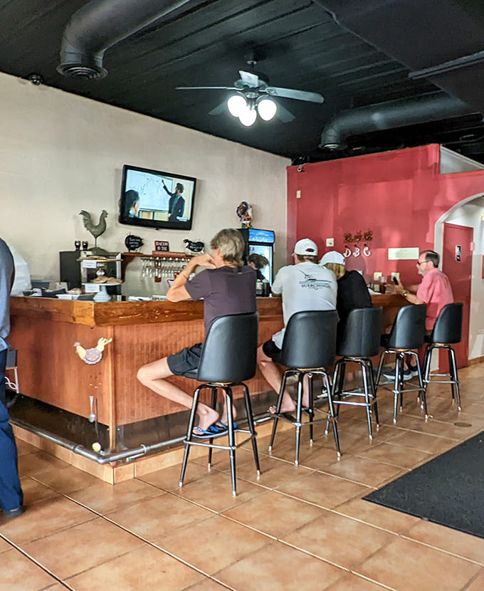 Pull up a stool at the counter and watch the breakfast ballet unfold while your coffee gets refilled automatically.