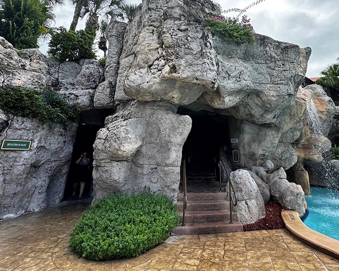 What looks like an ancient cave entrance is actually the gateway to the resort's famous grotto pool.